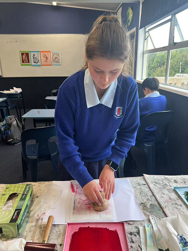 Exploring ancient art: students try traditional Chinese woodblock ...
