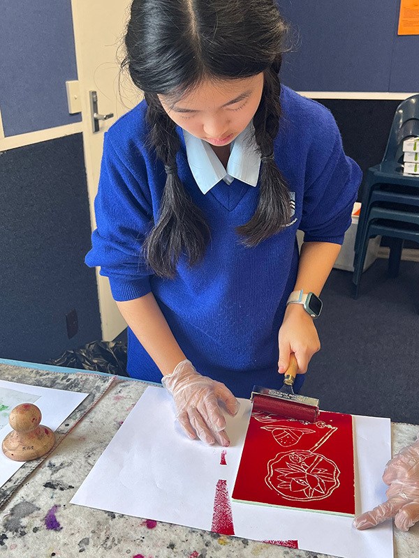 Exploring ancient art: students try traditional Chinese woodblock ...